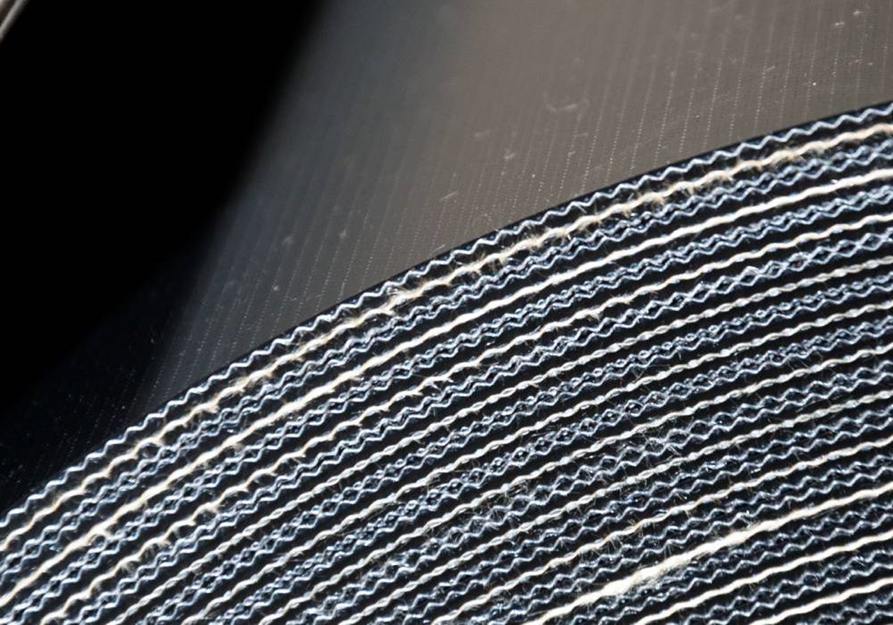 Fabric-based conveyor and processing belts