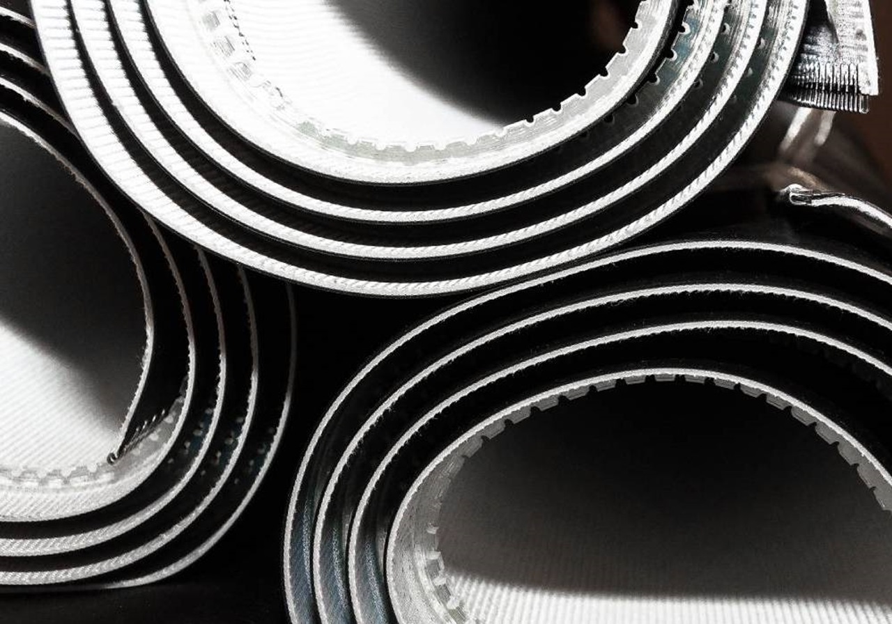 Fabric-based conveyor and processing belts